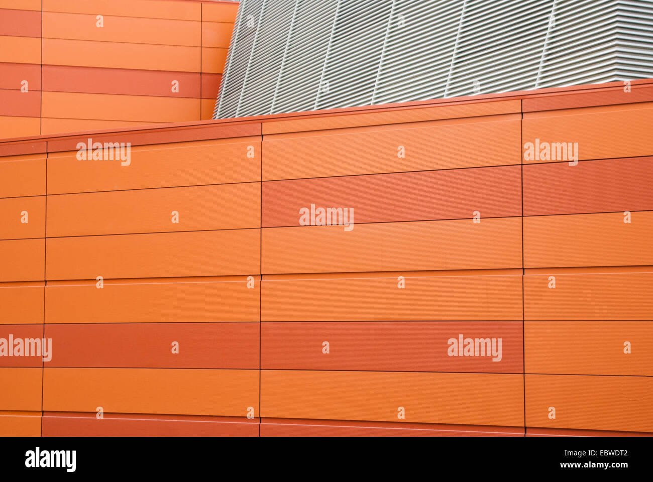 Vivid orange pattern block wall Stock Photo - Alamy