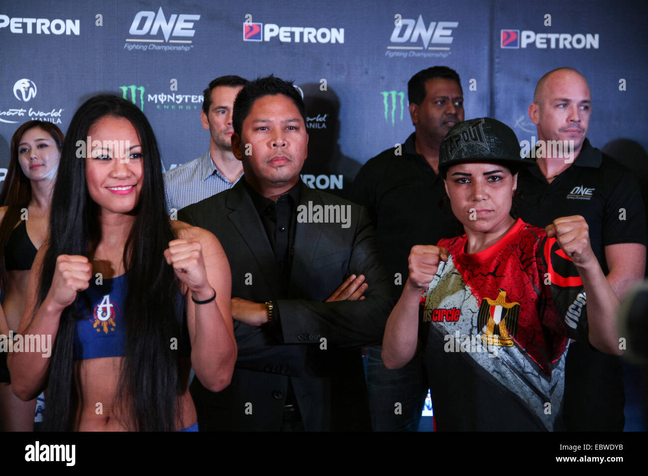 Ana Julaton (L) of the Philippines and Walaa Abbas (R) of Egypt pose ...