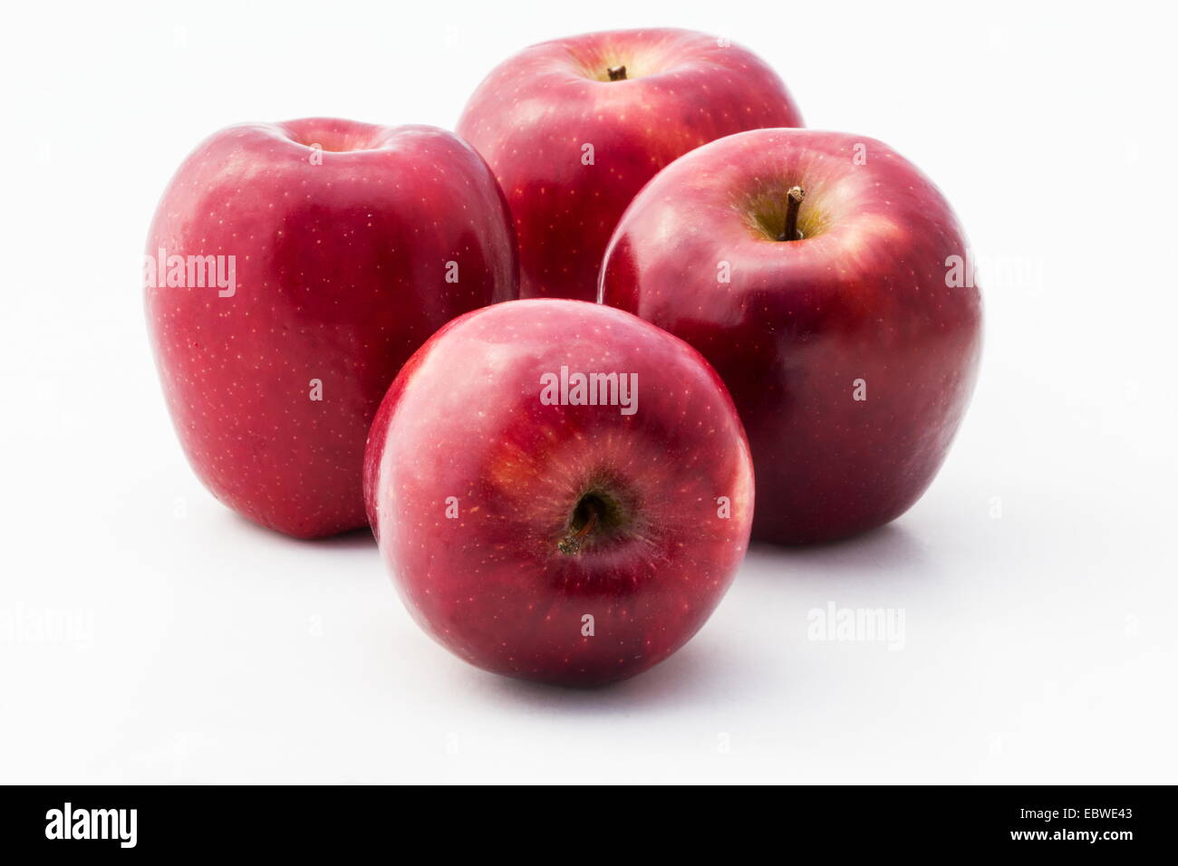 Red aplles on white background Stock Photo - Alamy