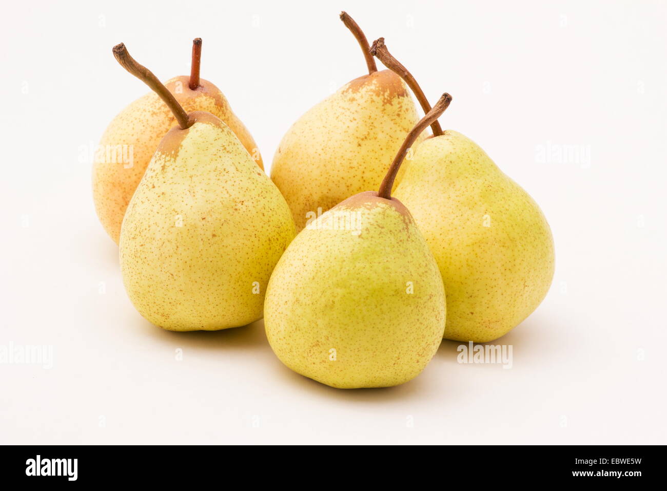 Five pears on white backgroound Stock Photo - Alamy