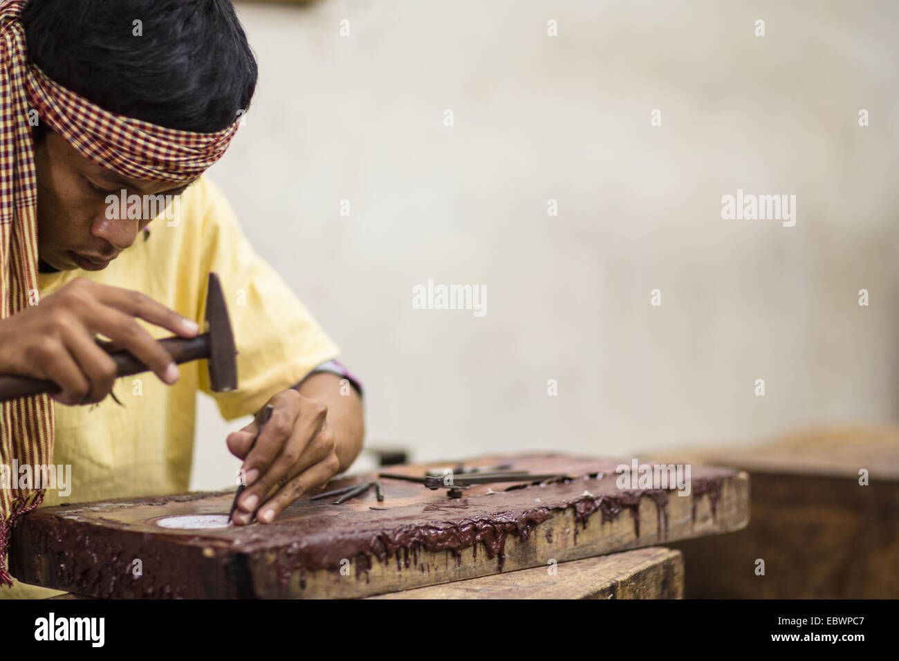 silversmith craftsman making jewelry in Asia Stock Photo - Alamy