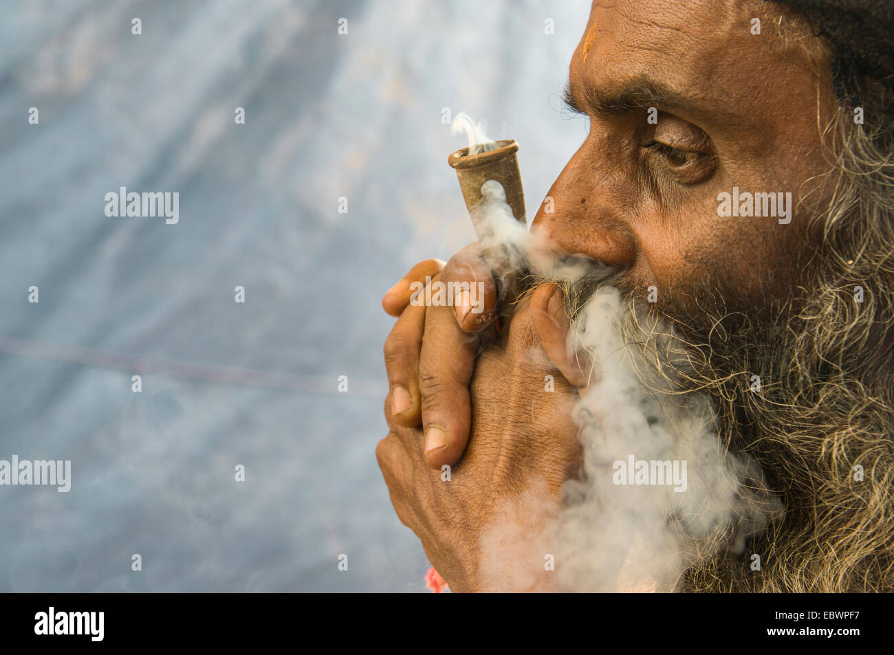 Sadhu smoke hi-res stock photography and images - Alamy