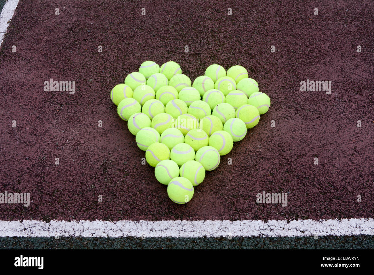 Tennis love heart in tennis balls Stock Photo - Alamy