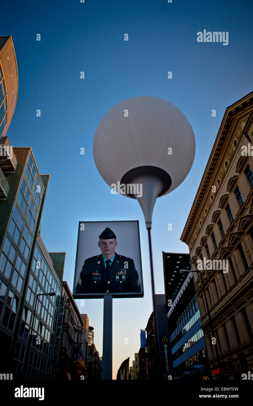 US border guard depicted on poster at Checkpoint Charlie during 25th ...