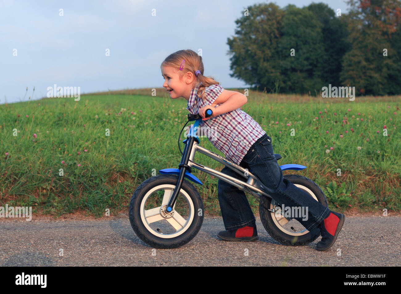 girl on a running wheel, Switzerland Stock Photo - Alamy