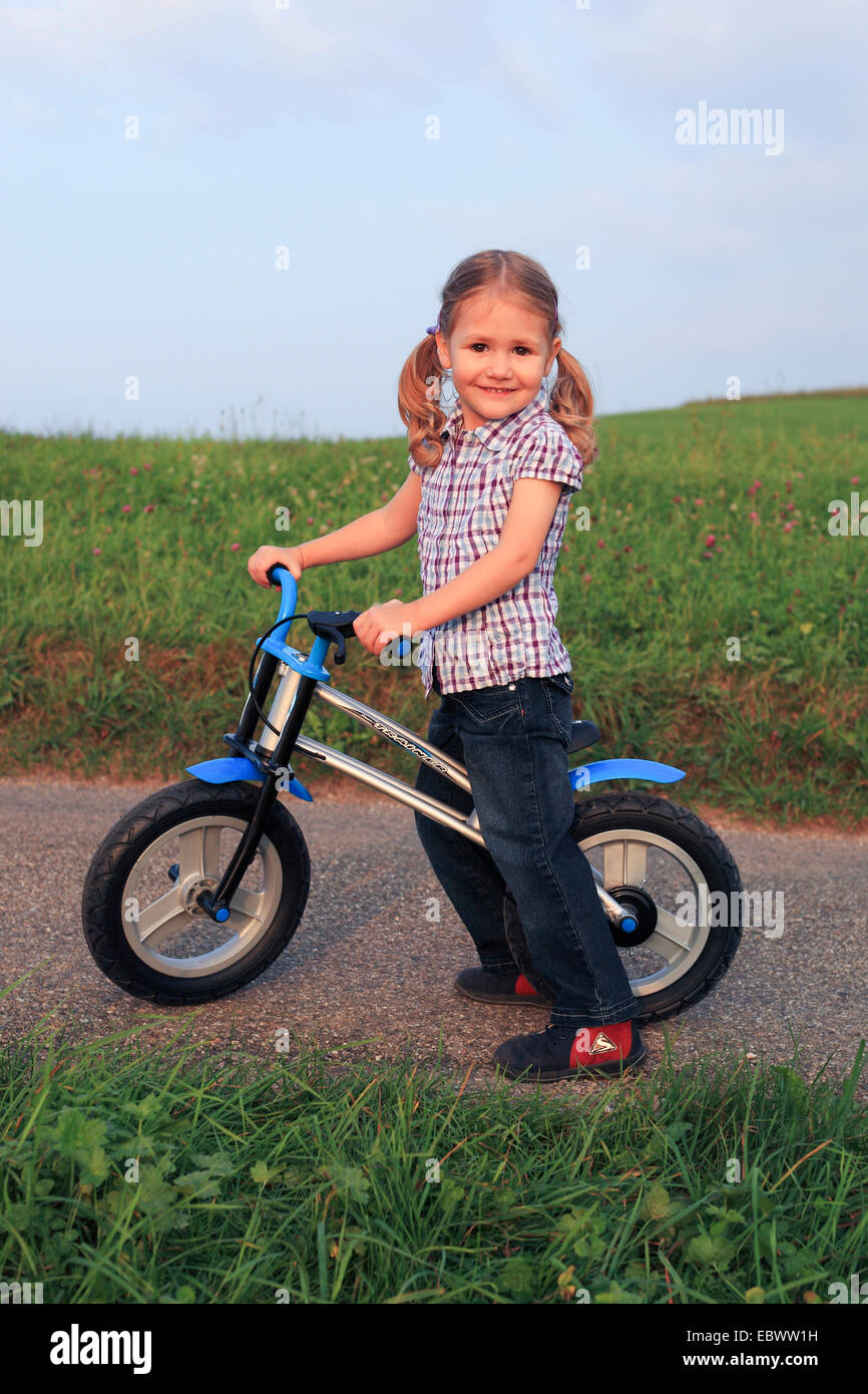 girl on a running wheel, Switzerland Stock Photo - Alamy