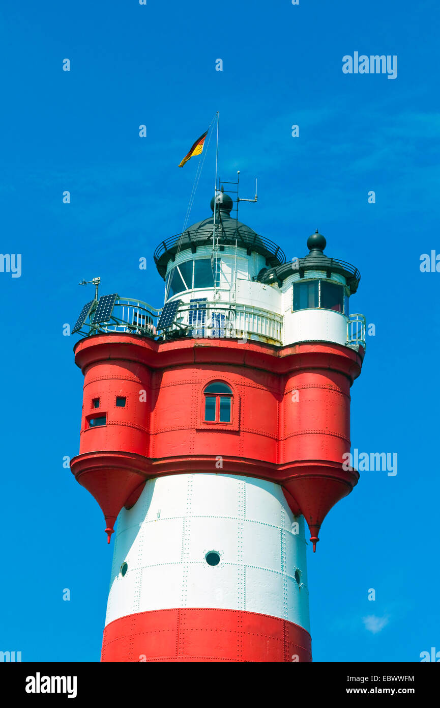 Roter Sand lighthouse in the river mouth of Weser with German flag ...