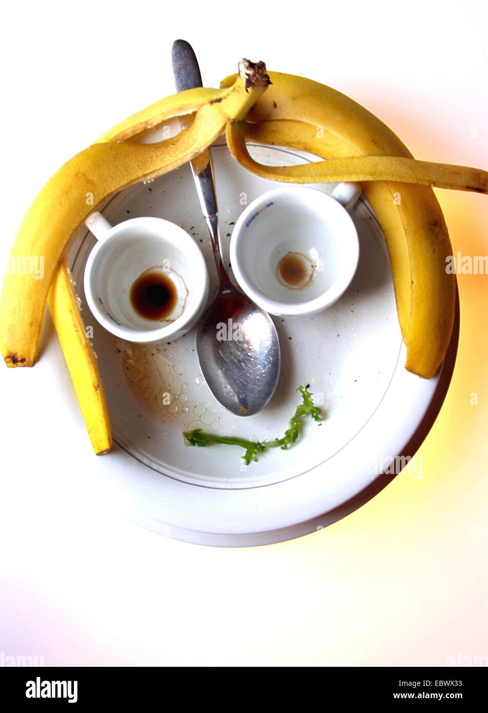 smiley built with the remains of a meal Stock Photo - Alamy