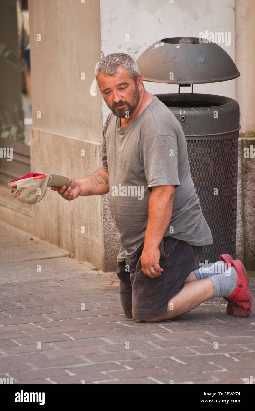 Beggars On The Sidewalk High Resolution Stock Photography and Images ...