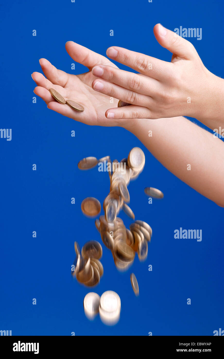 hand dropping money, Germany Stock Photo - Alamy