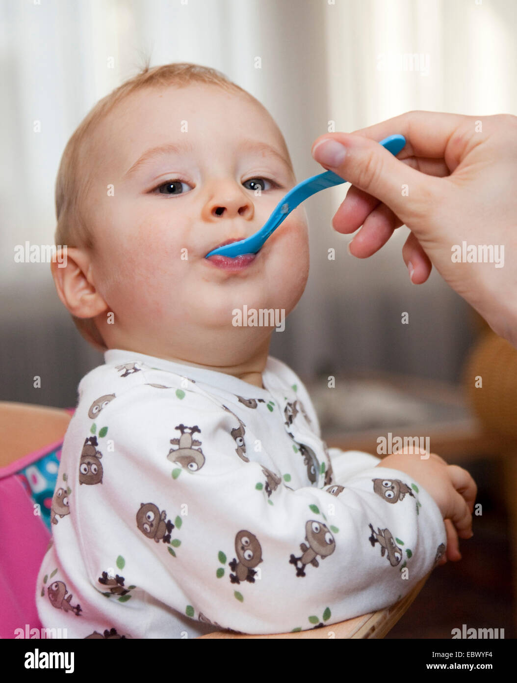 feeding a baby Stock Photo - Alamy