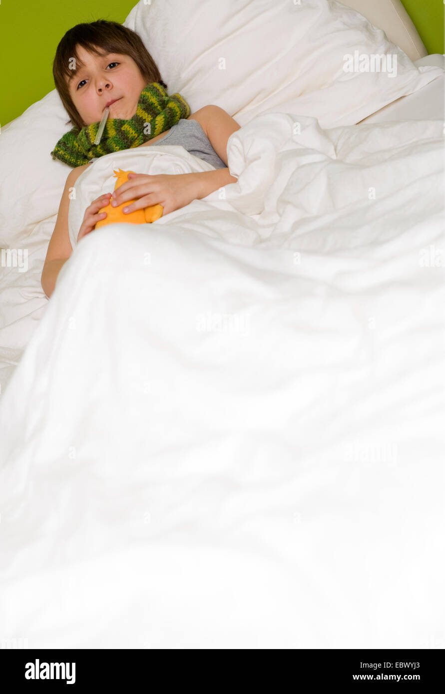 sick boy in bed Stock Photo - Alamy