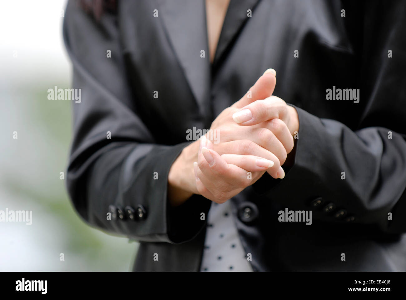 hand of a young woman in leather jacket Stock Photo - Alamy