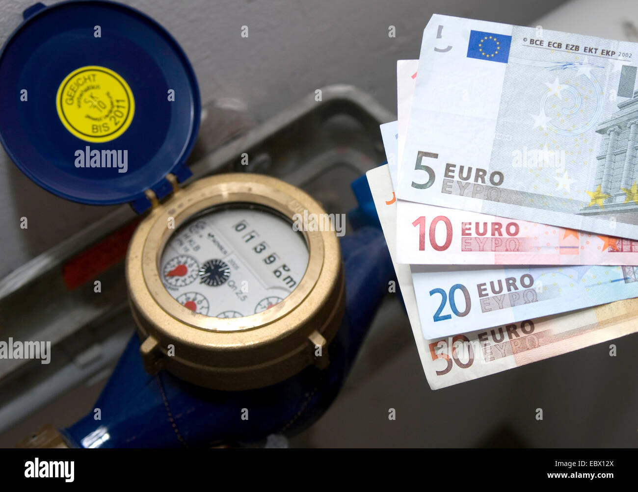 water flow water flow meter Euro bills Stock Photo - Alamy