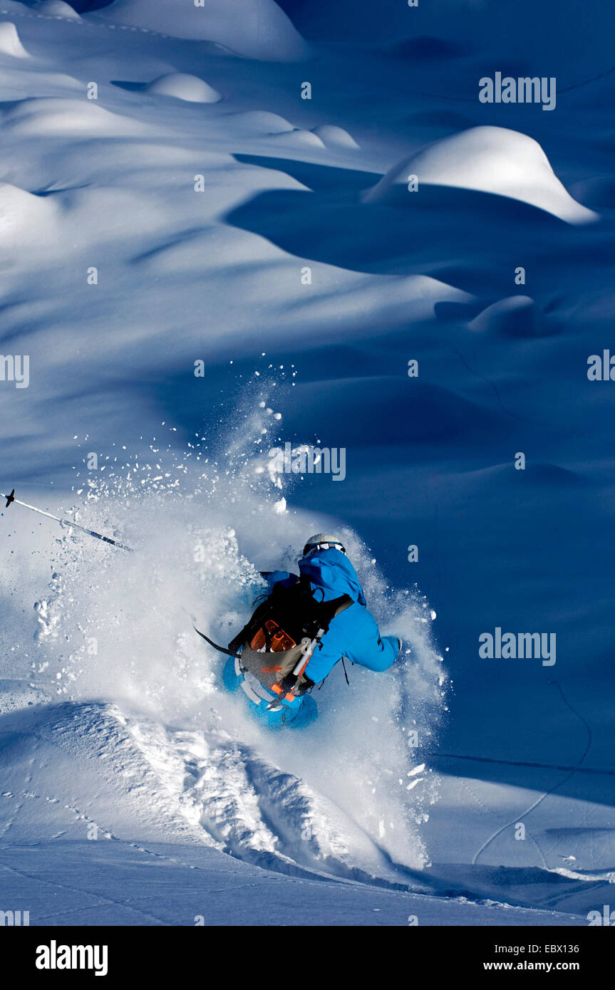 skier at the run in deep powder snow, France Stock Photo - Alamy