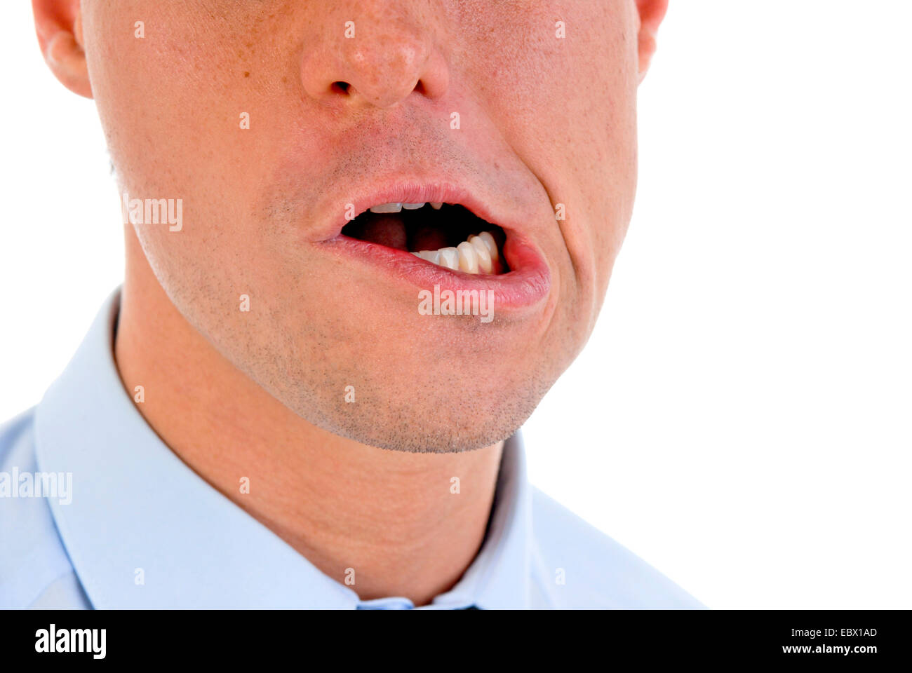 young man grimacing Stock Photo - Alamy