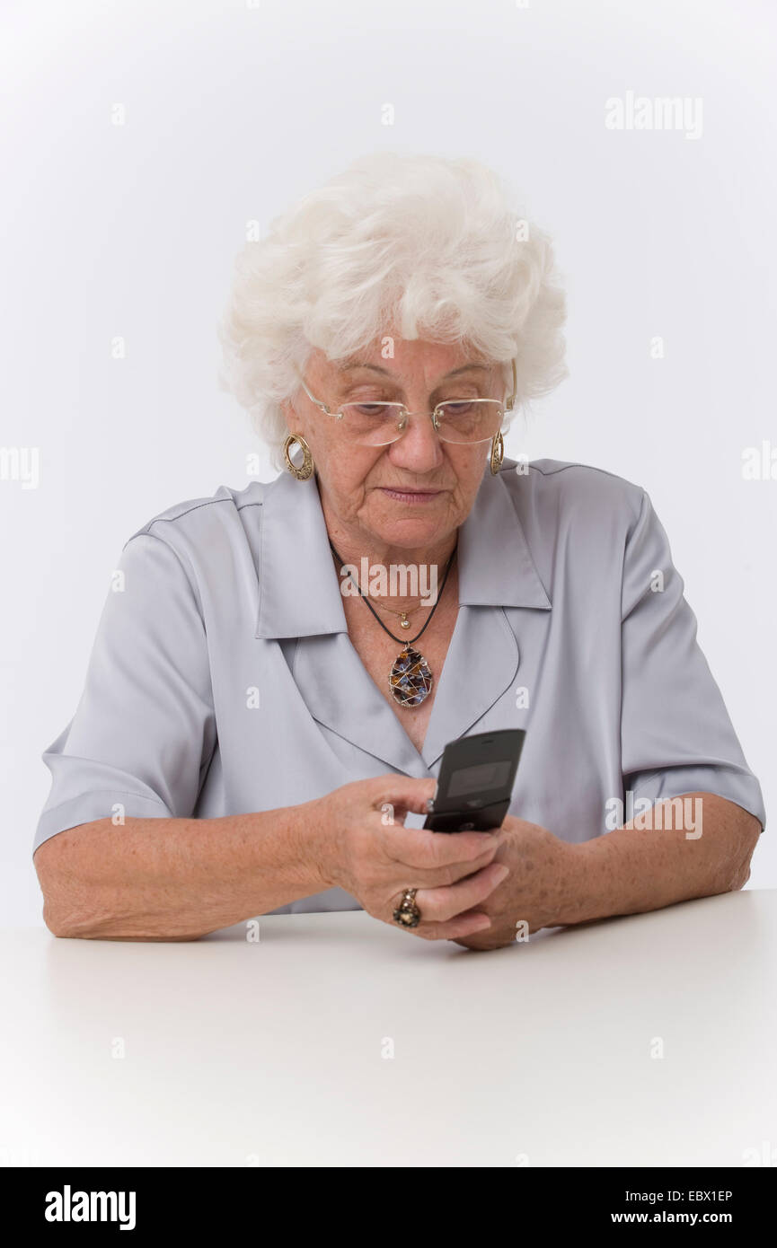old woman with mobile phone Stock Photo - Alamy