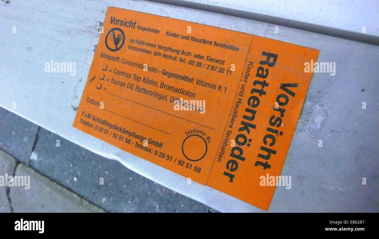 warning sign on a rattrap with toxic bait Stock Photo - Alamy