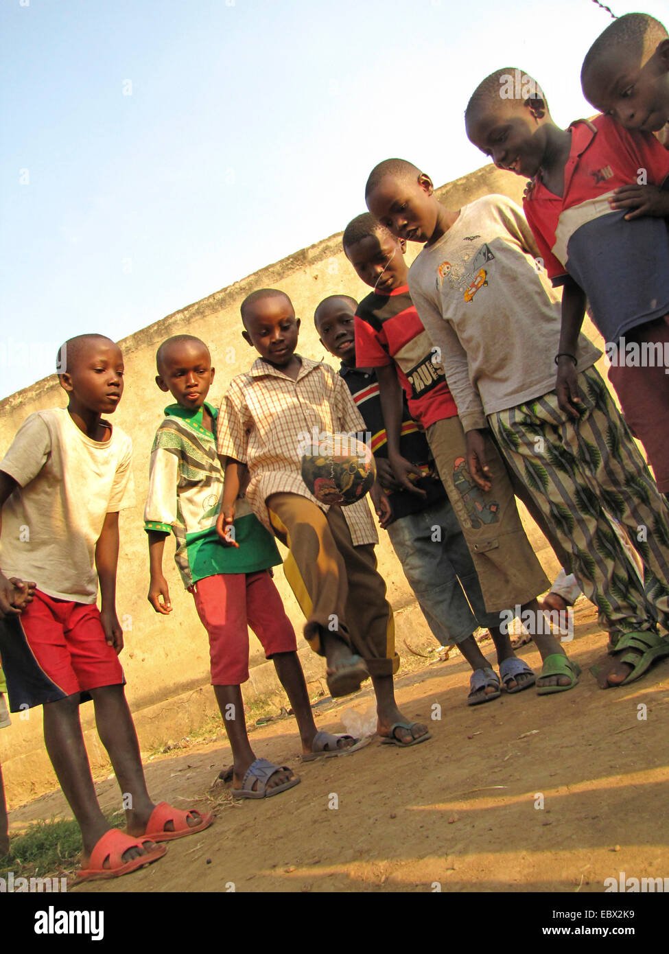 African kids playing football hi-res stock photography and images - Alamy