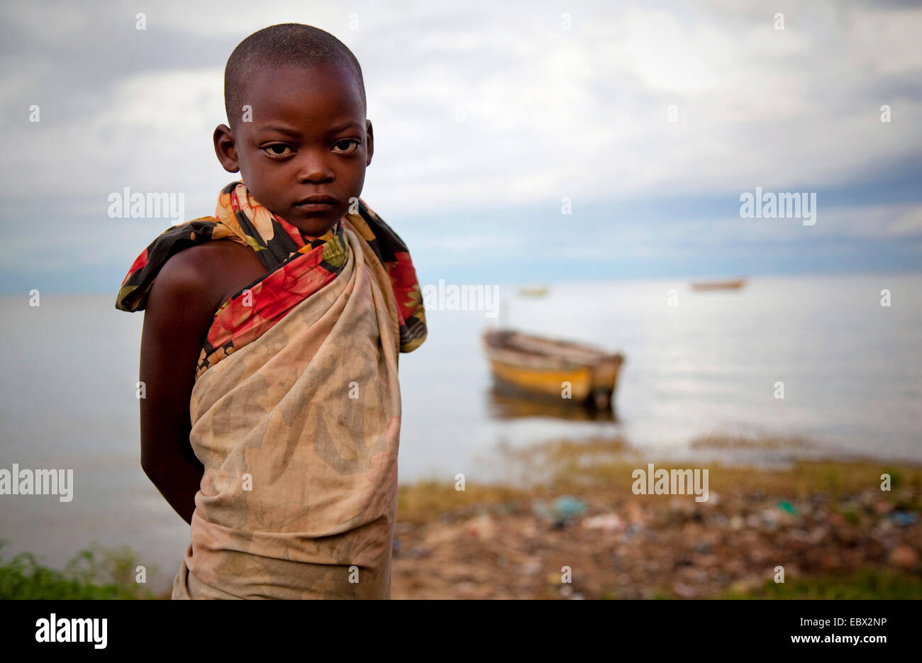 portrait of a young girl on the lakefront of Lake Tanganyika, Burundi ...