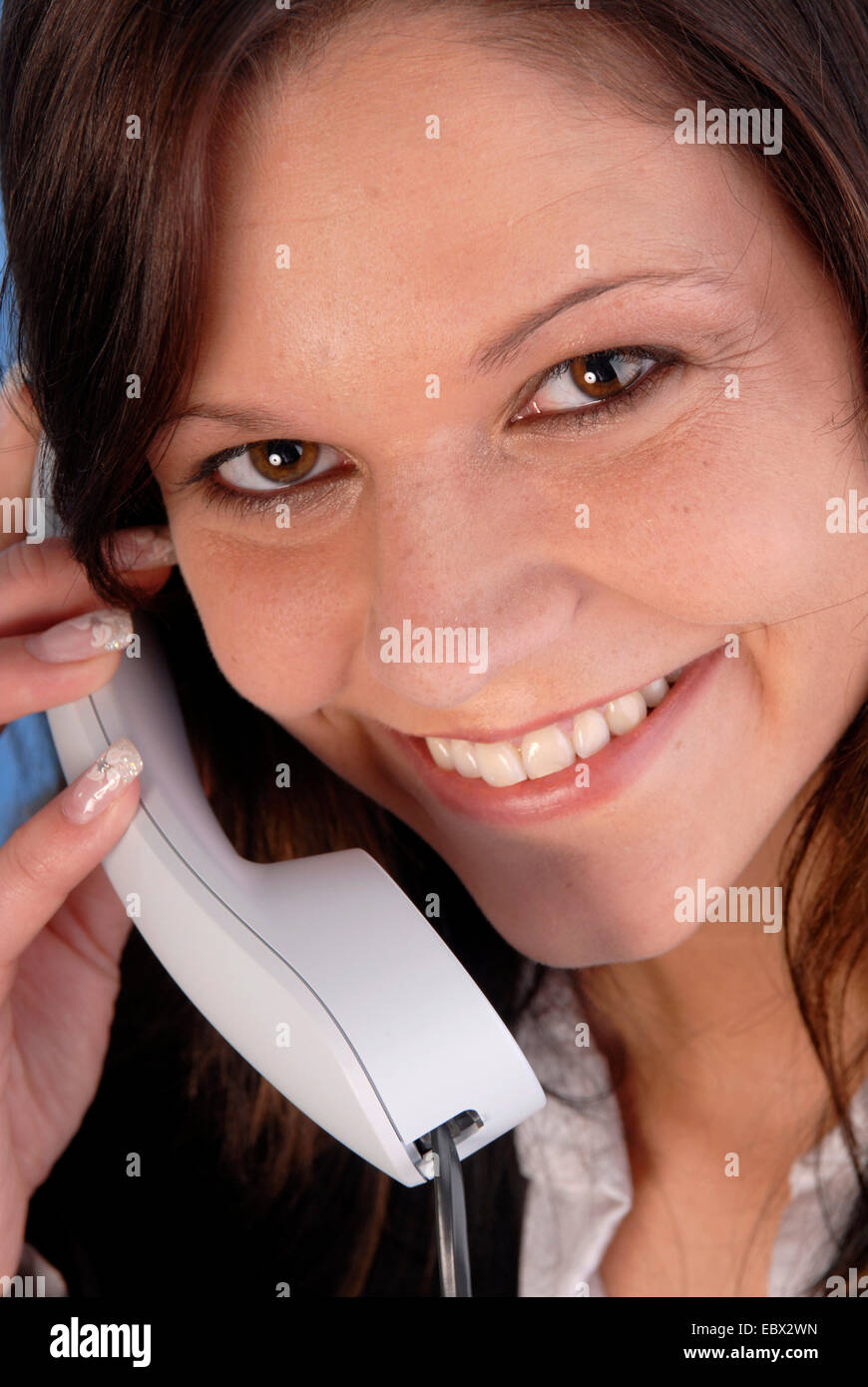 young woman with telephone Stock Photo - Alamy