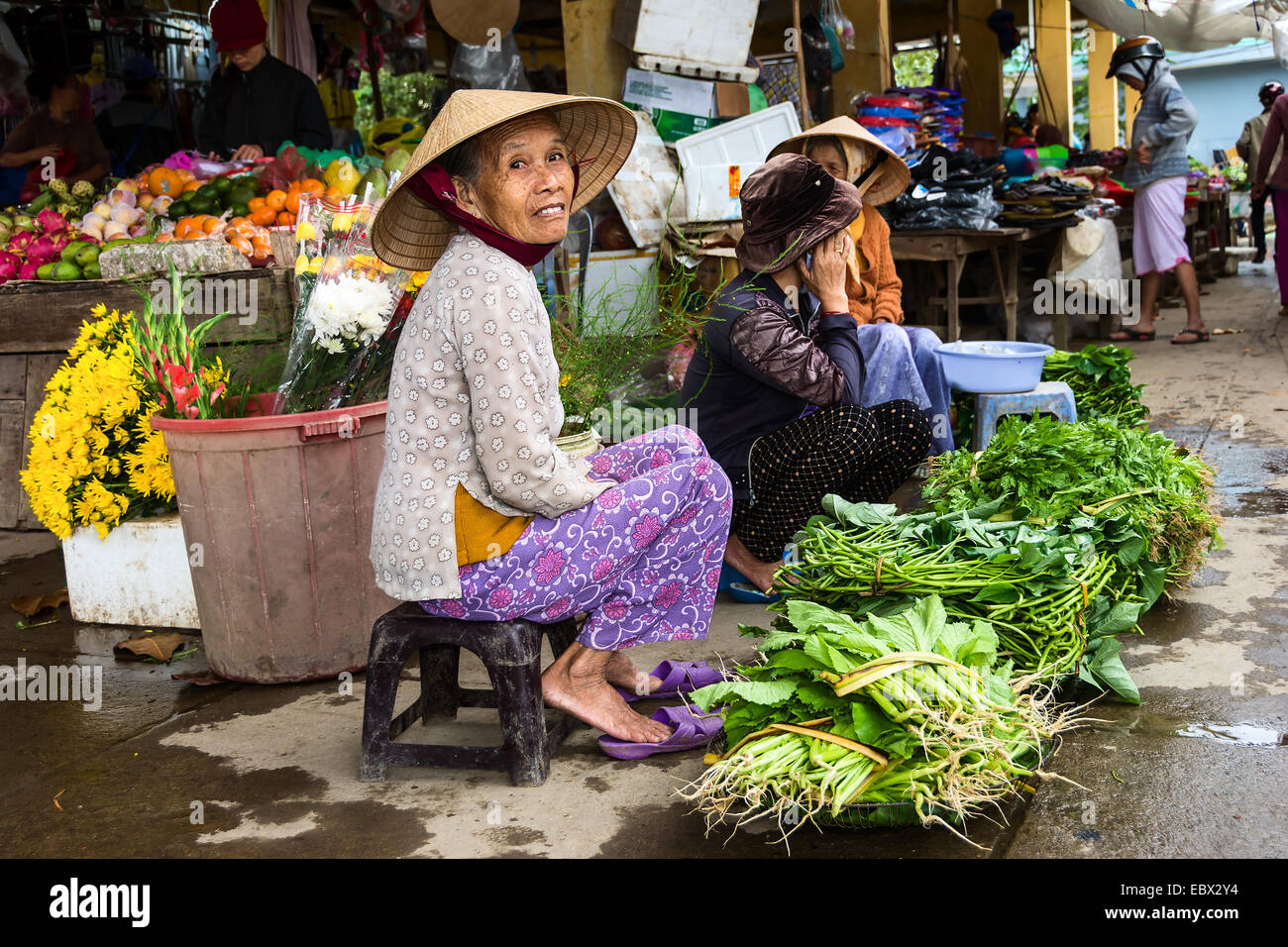 Lady market trader in a typical South East Asian market Stock Photo - Alamy