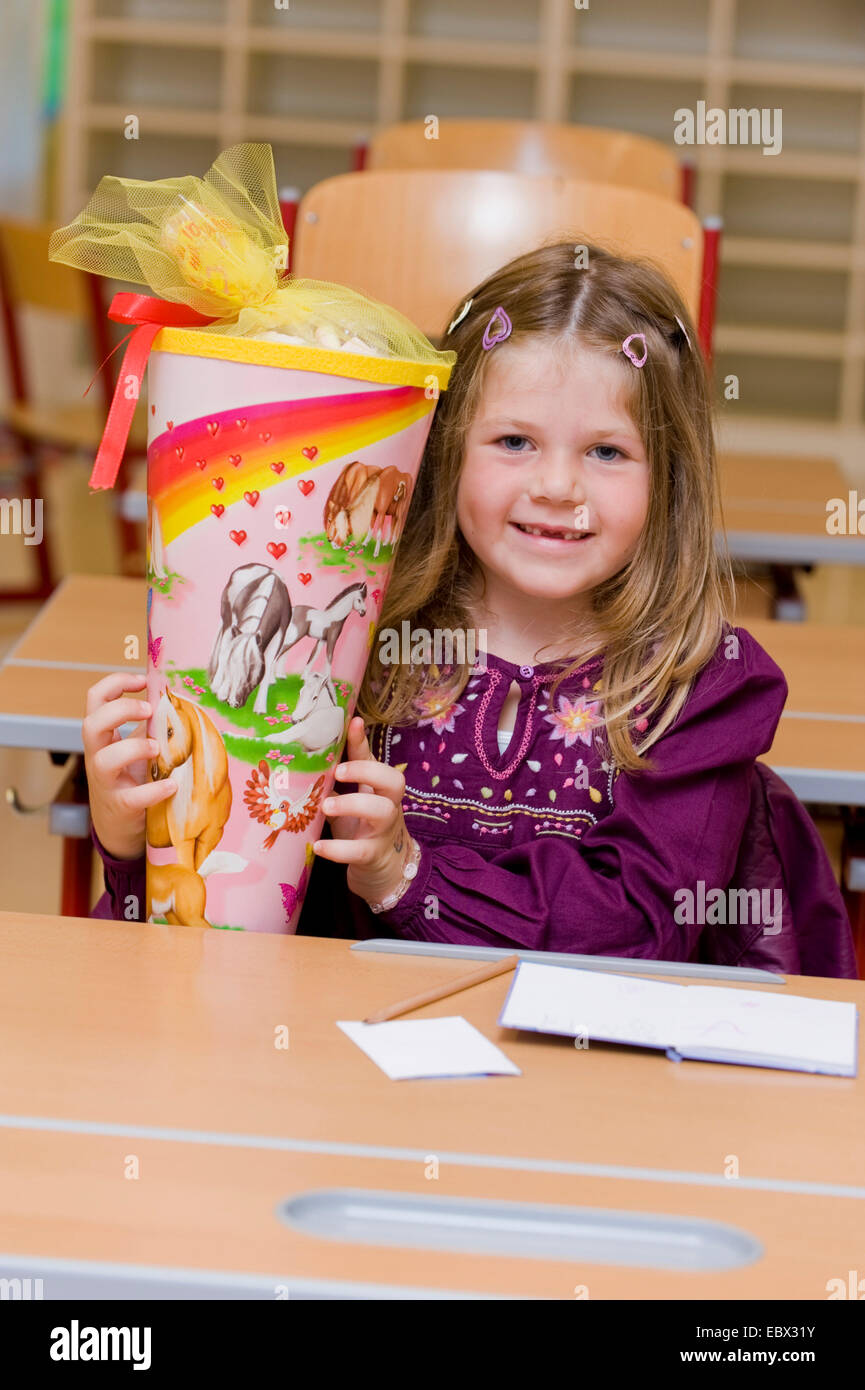 child starting school with school cone in classroom Stock Photo - Alamy