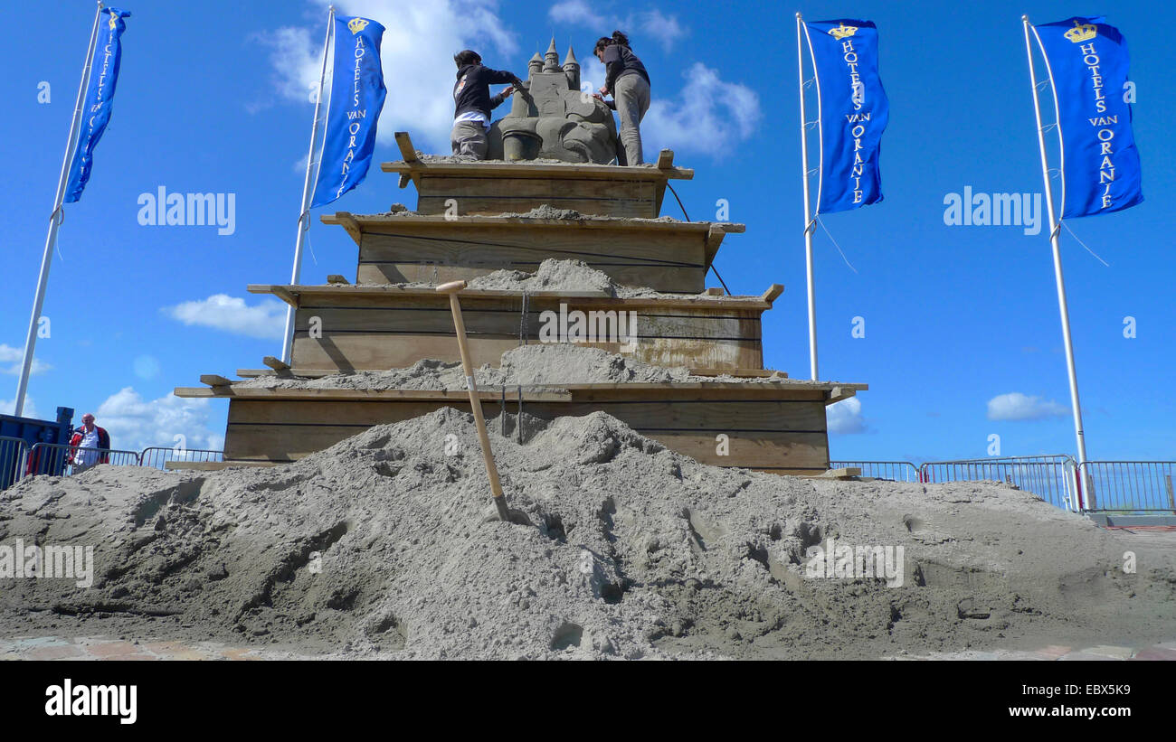 building of a sand figure at the sea front, Netherlands, Noordwijk ...