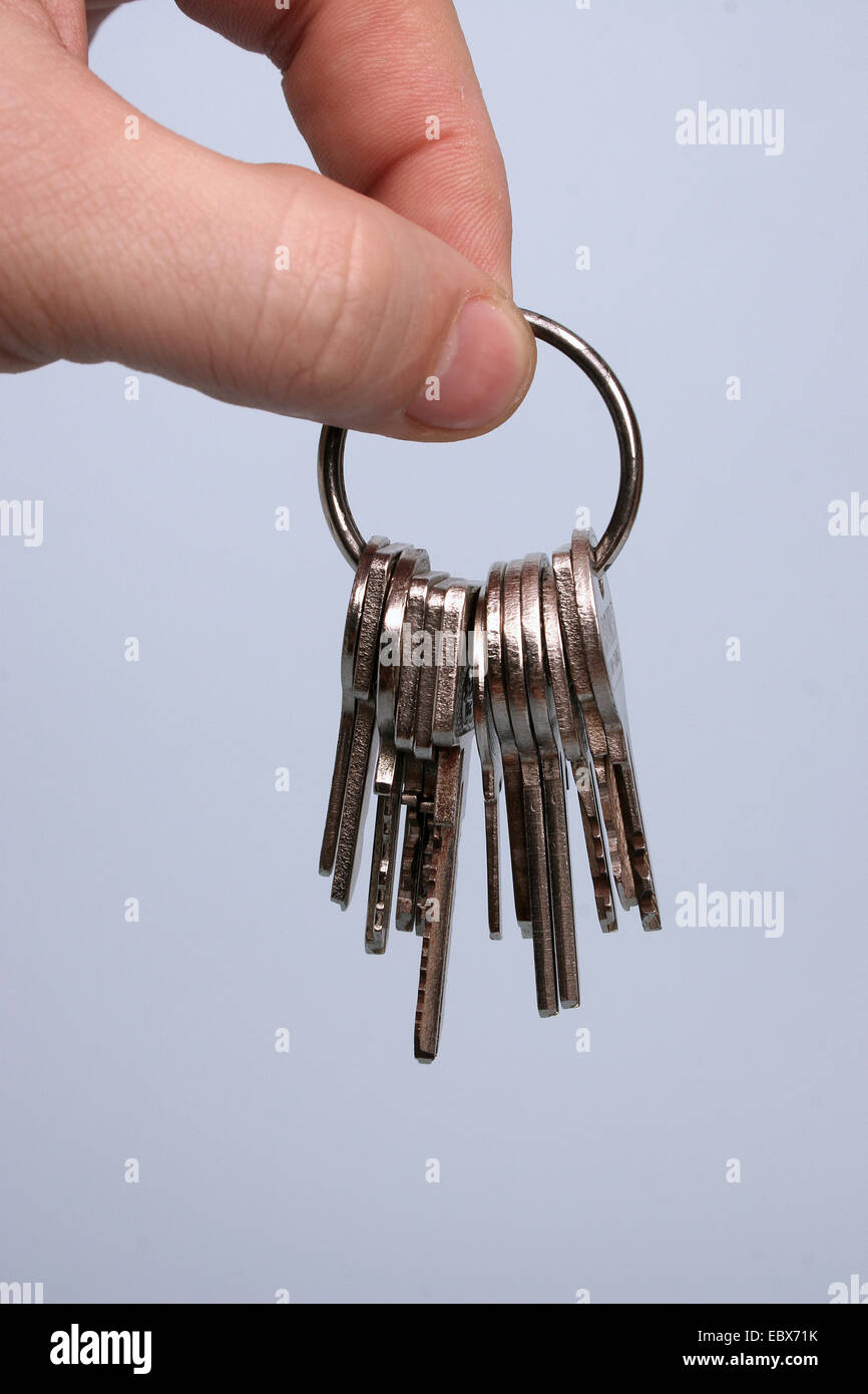 hand with bunch of keys Stock Photo - Alamy