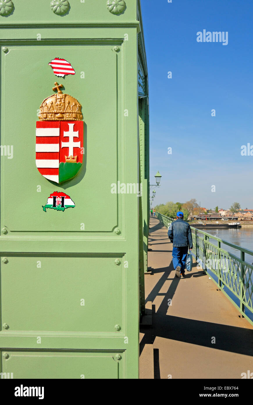 Komarom, Western Transdanubia, Hungary. Man walking across bridge over ...