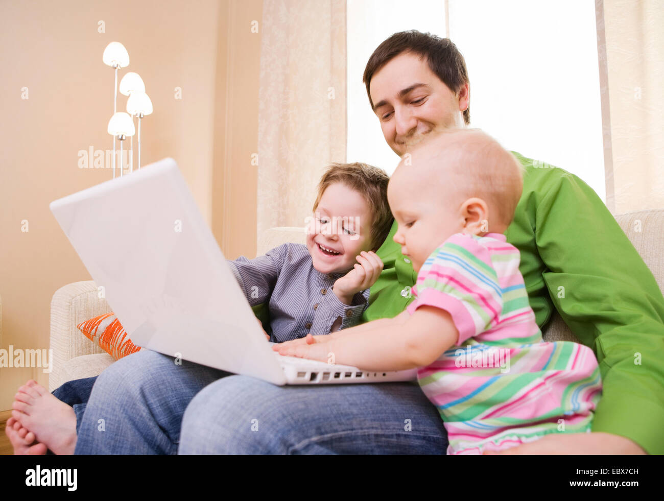 Man babysitting young girl hi-res stock photography and images - Alamy