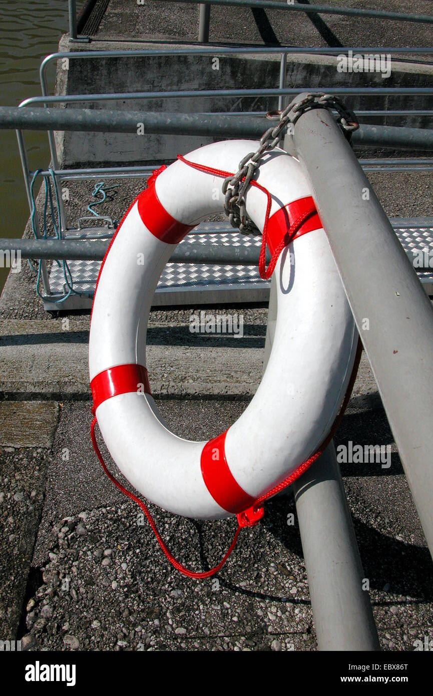 lifebelt at a pier Stock Photo - Alamy