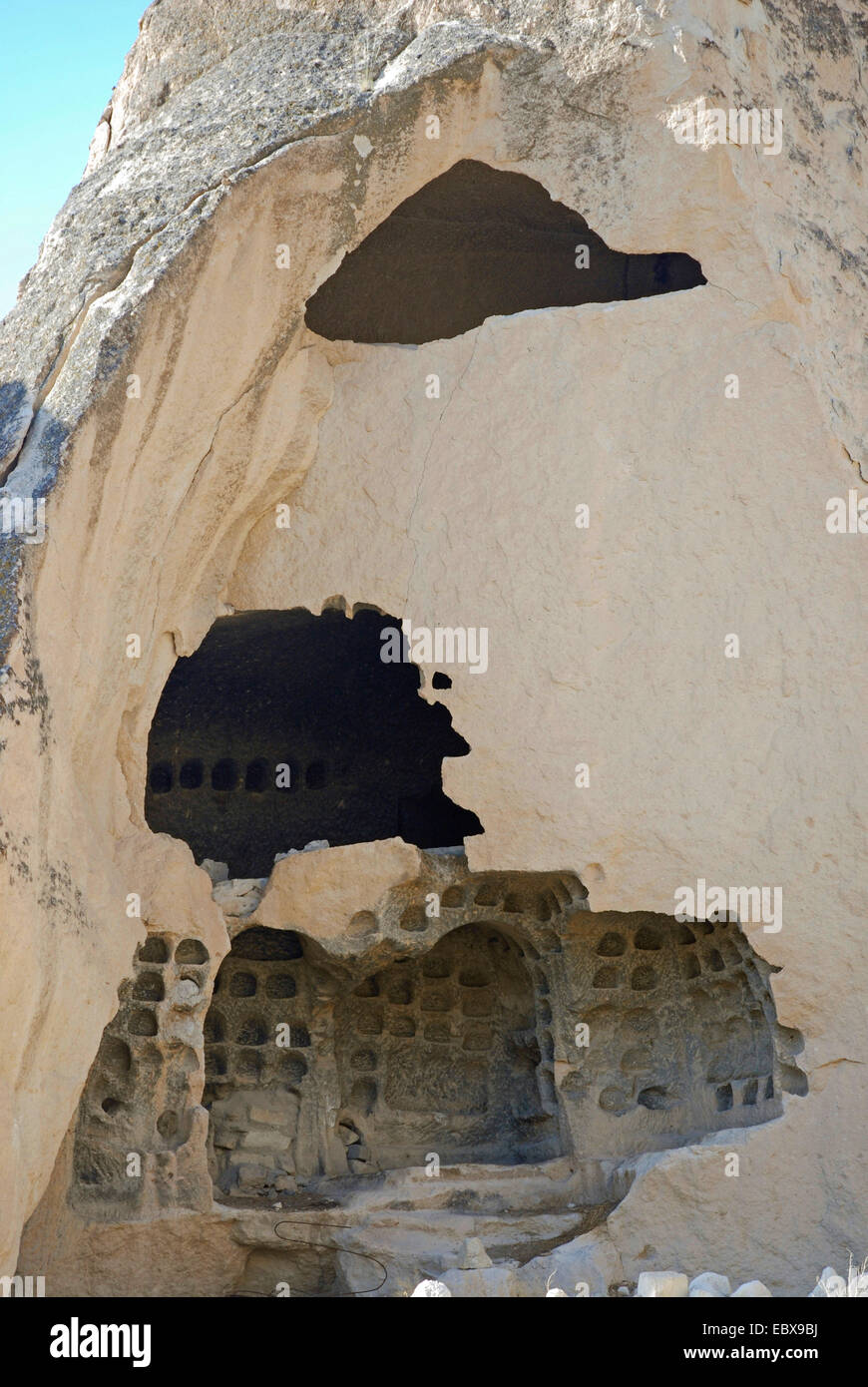 eroded and weathered rooms in a tuff formation, Turkey, Anatolia ...