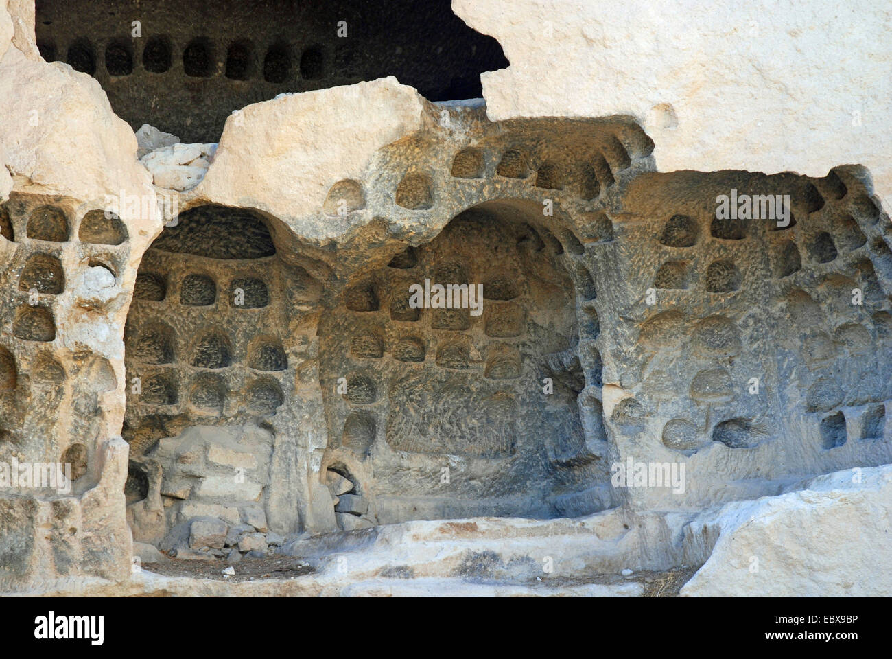 eroded and weathered rooms in a tuff formation, Turkey, Anatolia ...