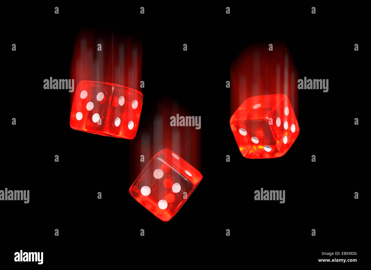 three red glowing falling cubes Stock Photo - Alamy