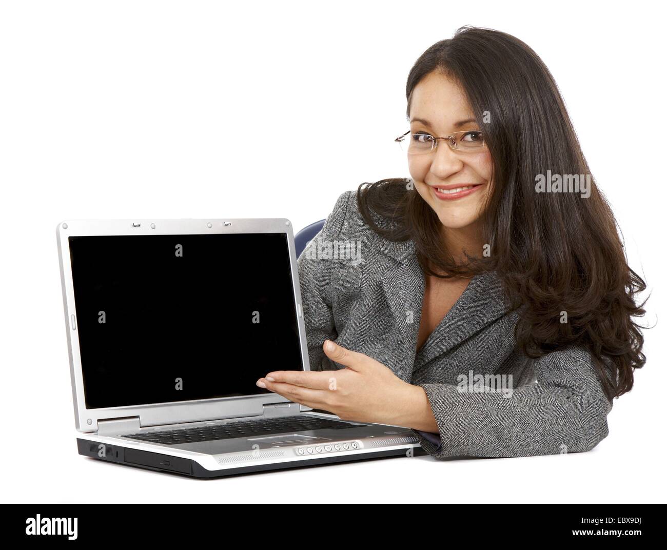 Business woman displaying a laptop computer Stock Photo - Alamy