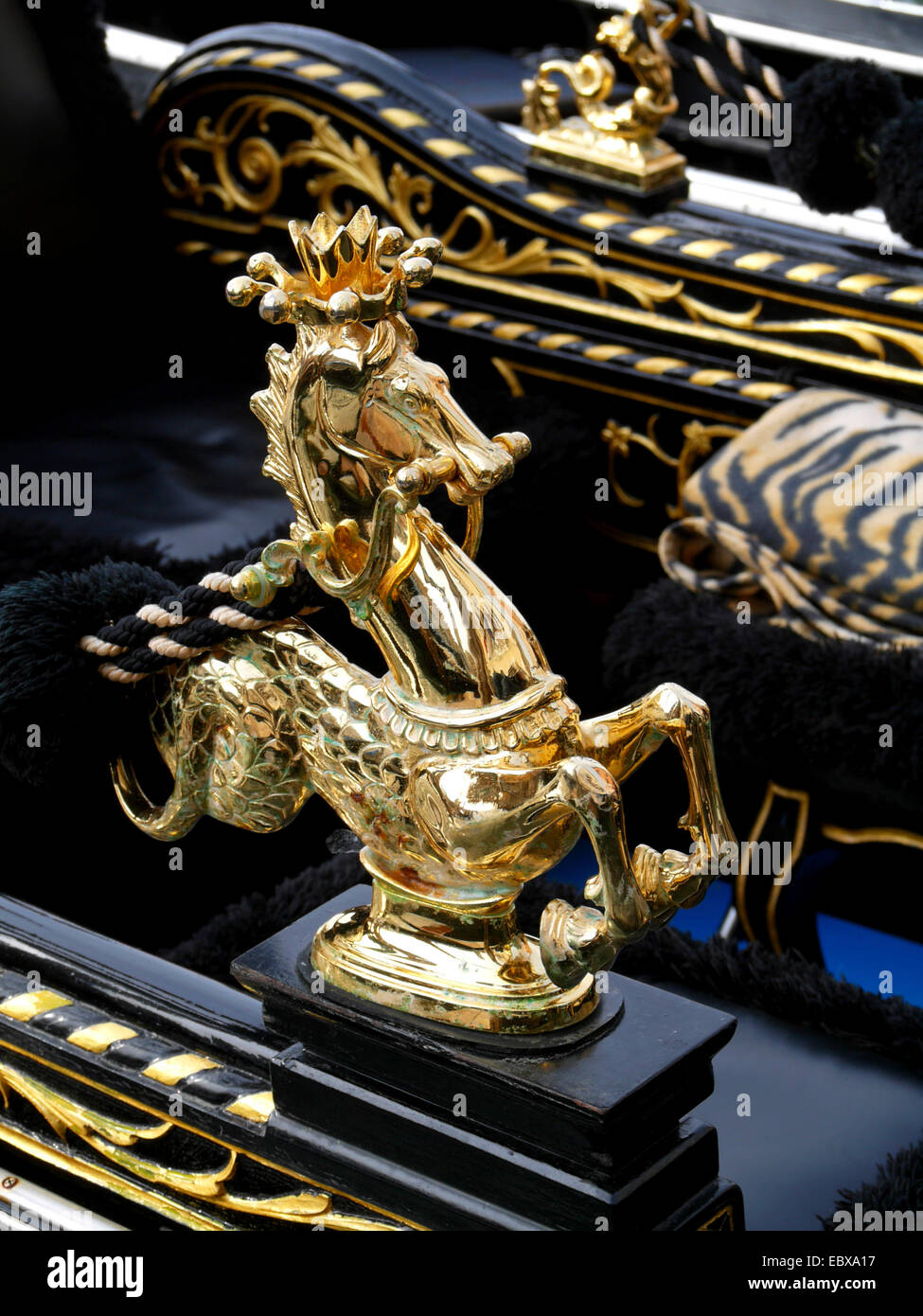 Venice gondola, with ornaments of a golden figures, Italy, Venice Stock ...