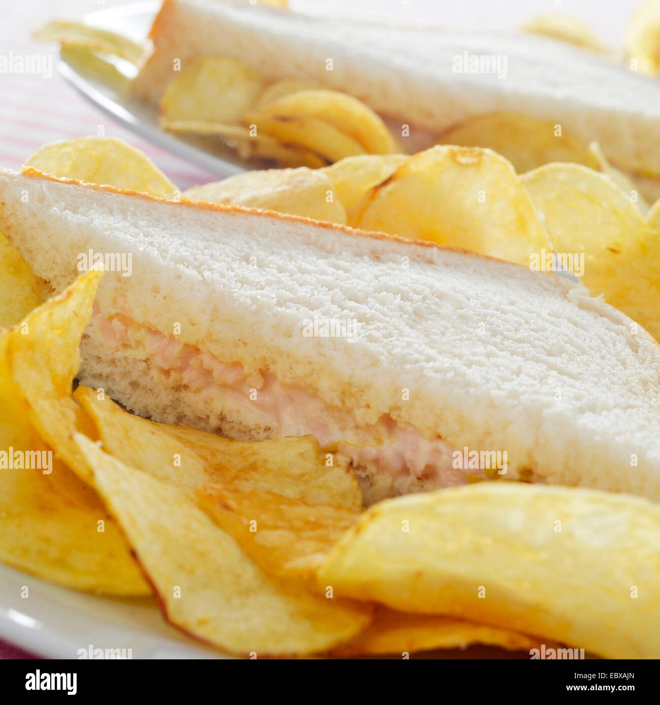 closeup of some plates with appetizing sandwiches and chips Stock Photo ...