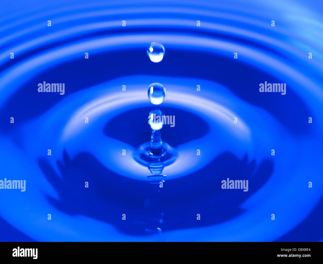 Blue water drop falling down hi-res stock photography and images - Alamy