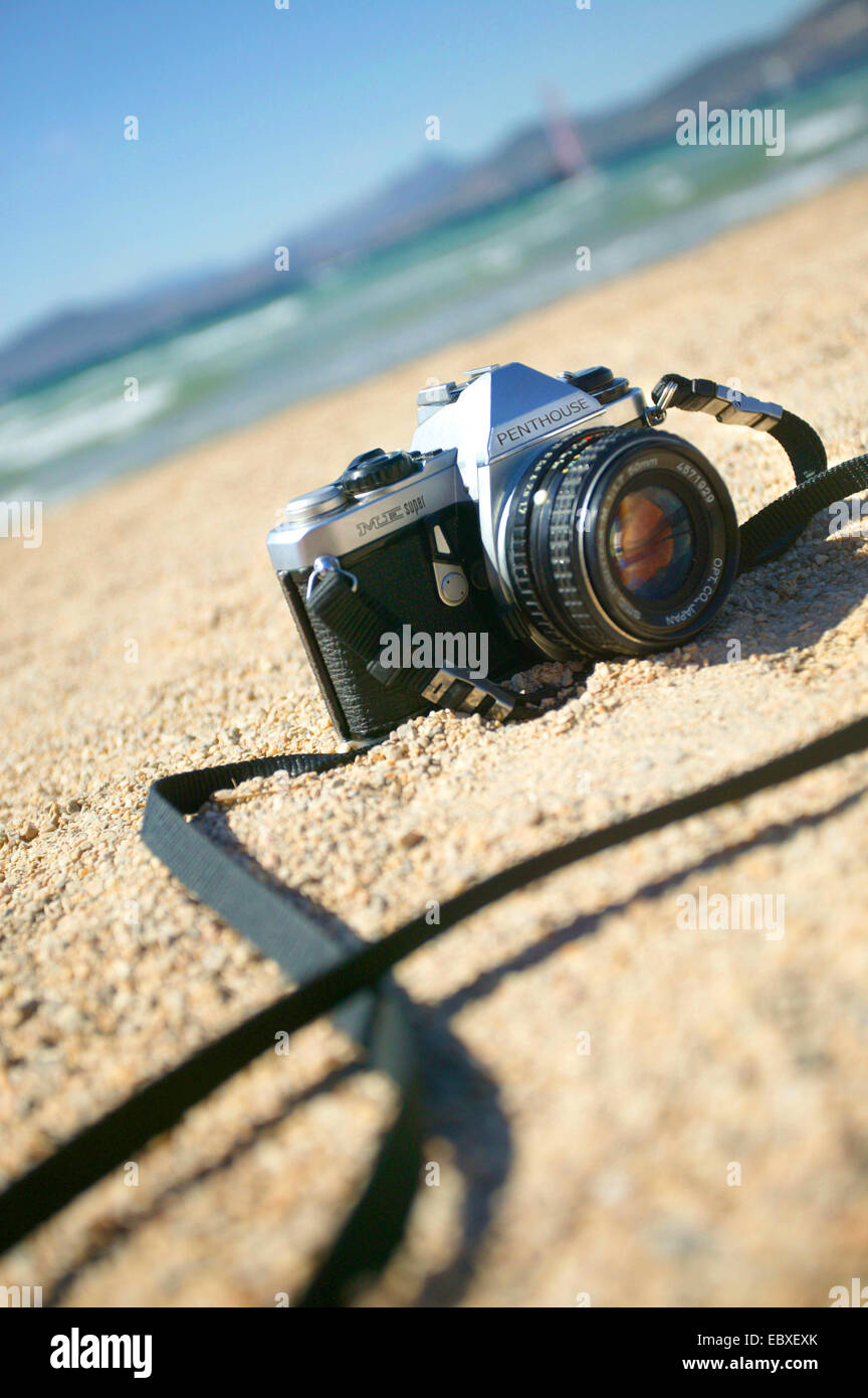 camera lying on the beach Stock Photo - Alamy