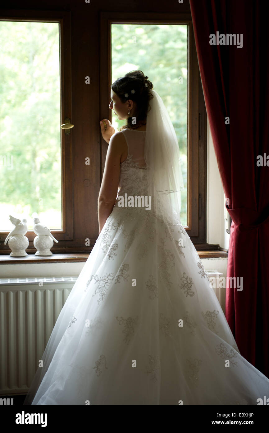 A bride waiting at the window Stock Photo - Alamy