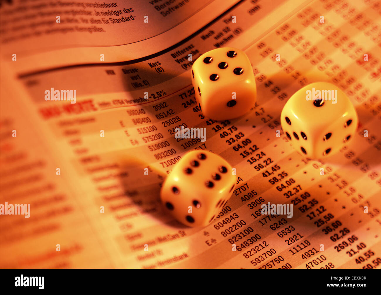 symbol, dice on a contango, coloured light Stock Photo - Alamy