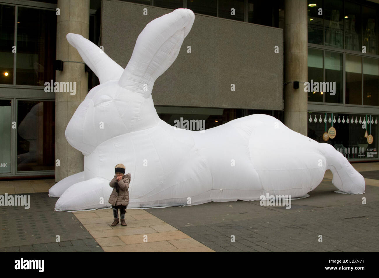 London,UK. 5th December 2014. Five 7metre high inflatable white rabbits ...