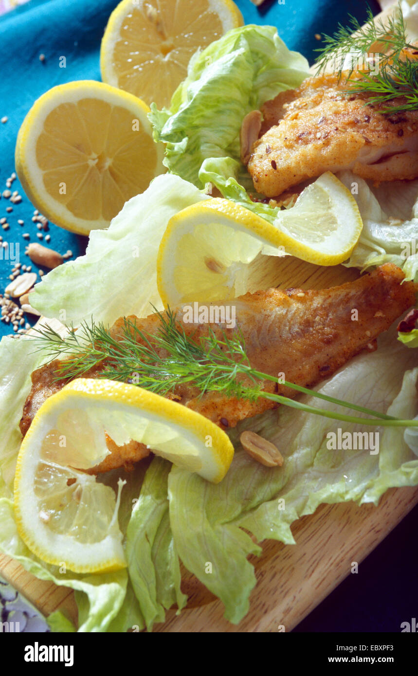 fillet of fish with salad Stock Photo - Alamy