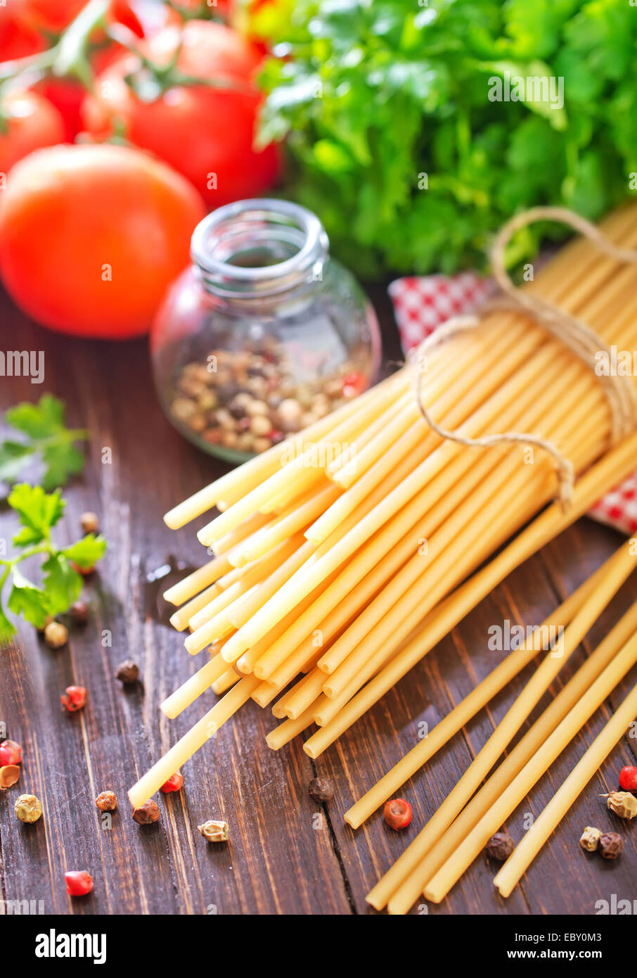 raw pasta with tomato Stock Photo - Alamy