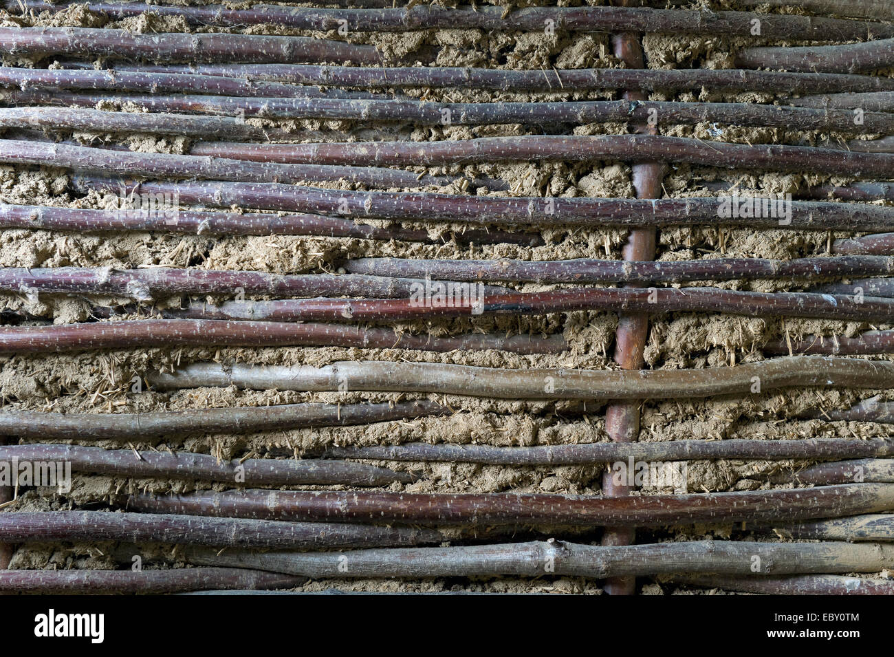 Wall construction made of woven hazel rods lined with clay, detail of a ...