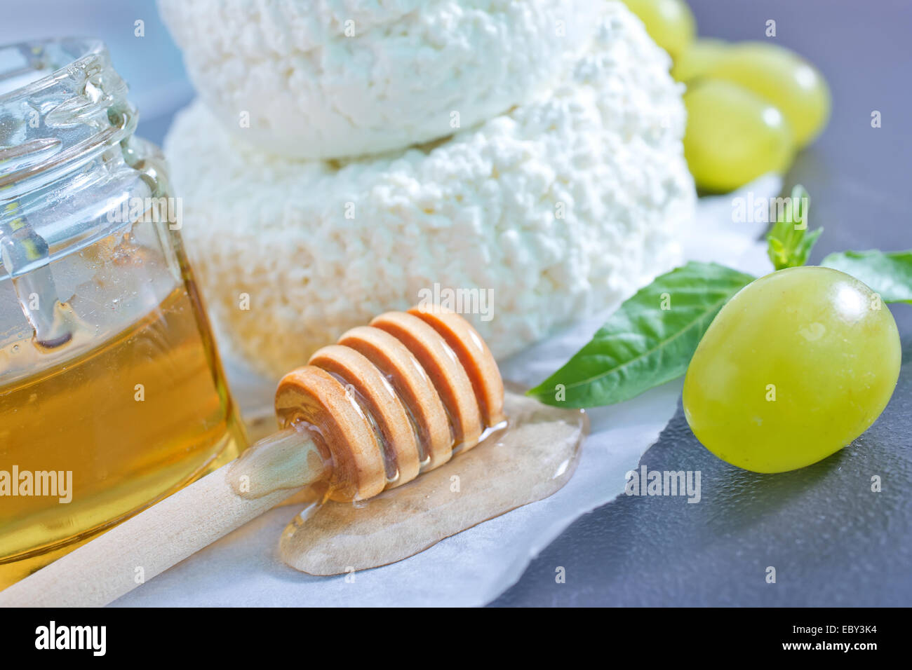 cheese, honey and grape Stock Photo - Alamy