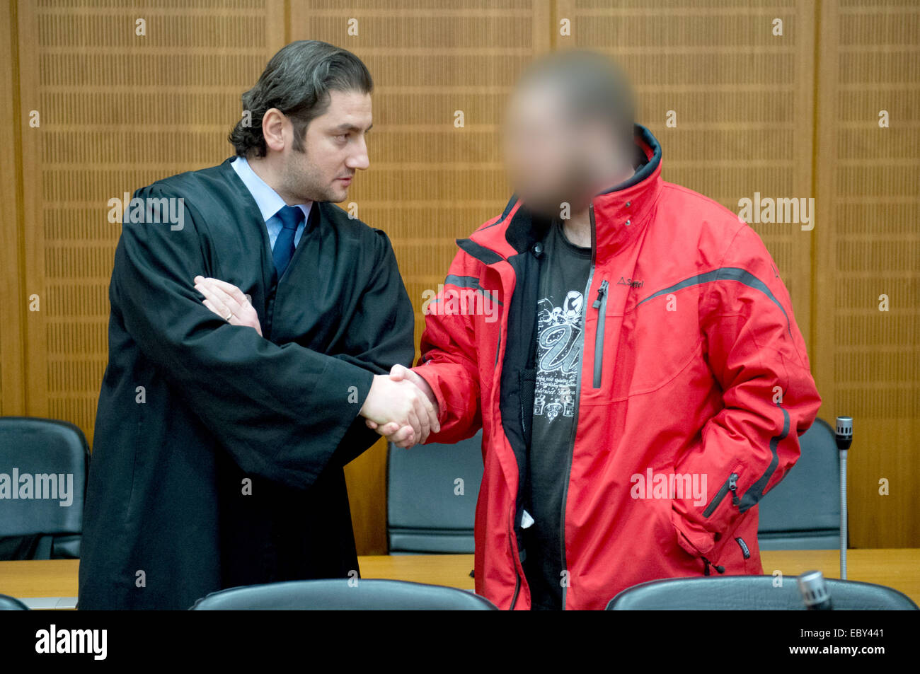 The defendant Kreshnik B. (C) and his lawyer Mutlu Gunal are pictured ...