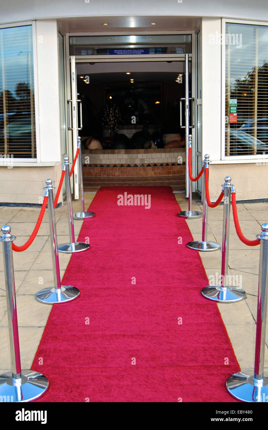 An empty red carpet leading into the wedding venue Stock Photo - Alamy