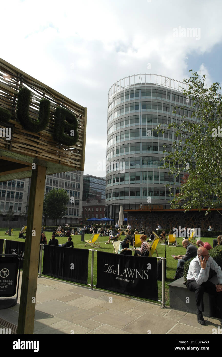 Sunny portrait, Lawns Club to 3 Hardman Square, man talking cell-phone ...